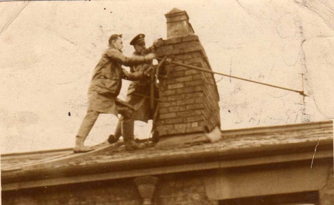 November 1960 2 firemen make safe a chimney on roof | | Blackburn Fire ...